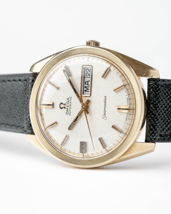 Vintage Omega Seamaster day date with gold capped case and a white ...