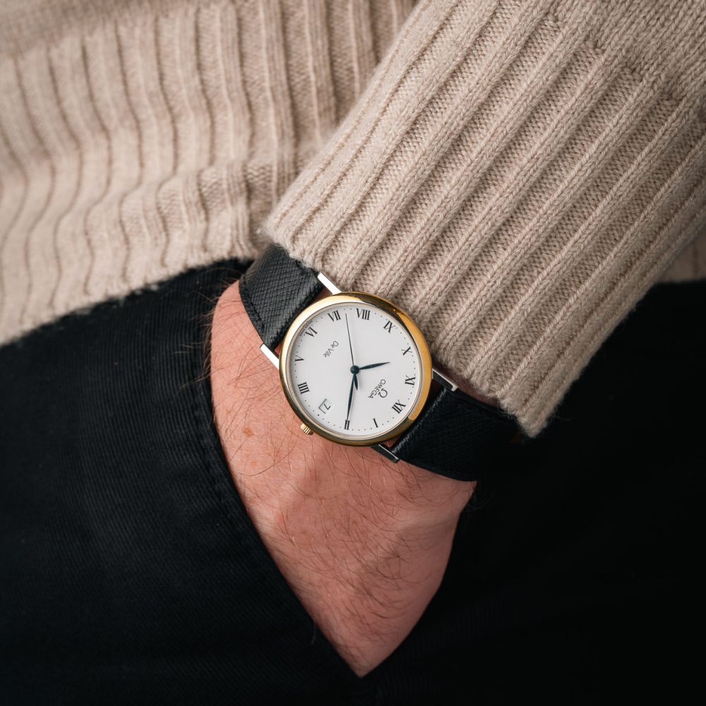 Vintage Omega De Ville quartz with white roman numeral dial in a two ...